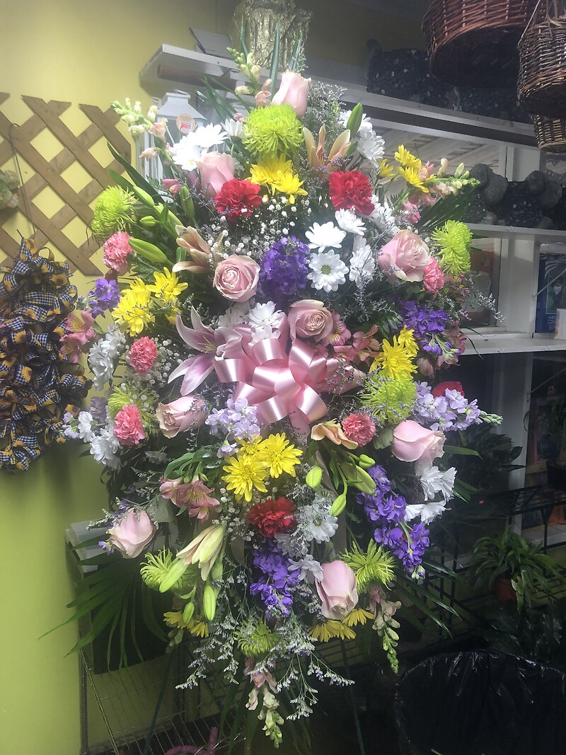Seasonal color mixed spray arranged by a florist in Wantagh, NY USA ...
